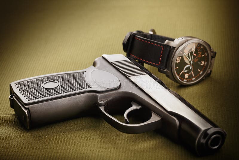 Gun and watch stock photo. Image of steel, metal, military - 19826984