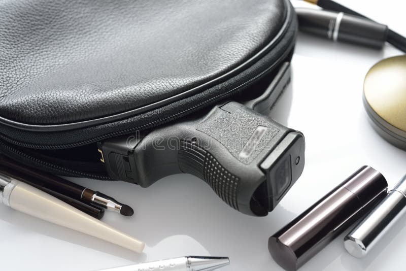 Handgun in Purse stock photo. Image of police, femininity - 15002614
