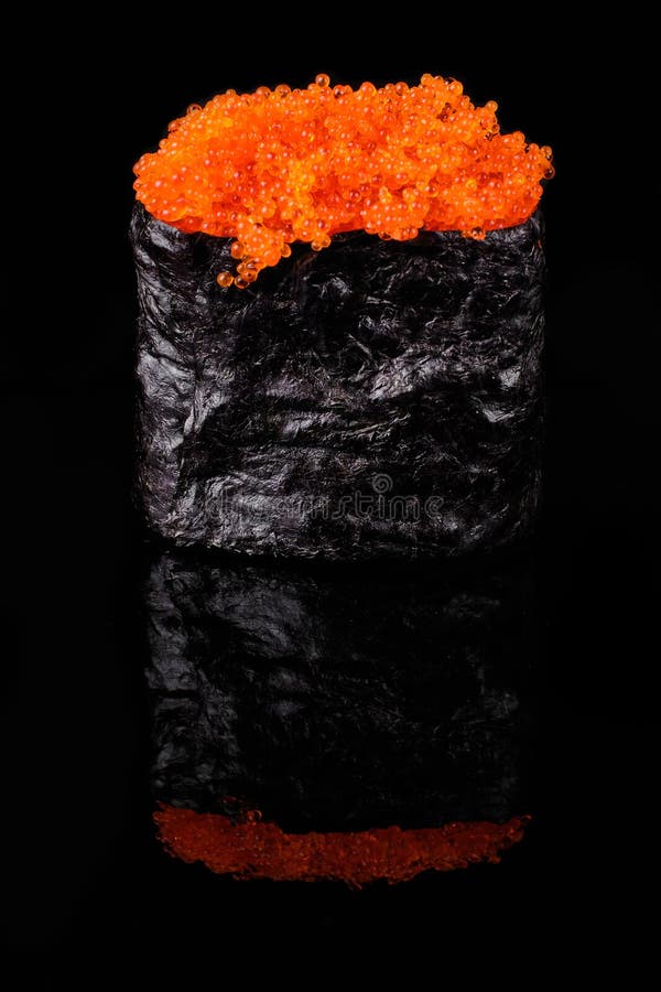Gunkan Maki Sushi with Red Flying Fish Roe on Black Background Stock ...