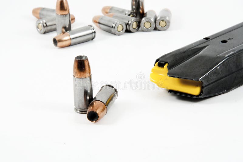 Guns an Ammo stock photo. Image of spent, guns, white - 83292910