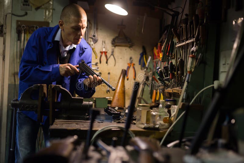 Gunsmith Assembling Smallbore Sporting Pistol in Workshop Stock Image ...