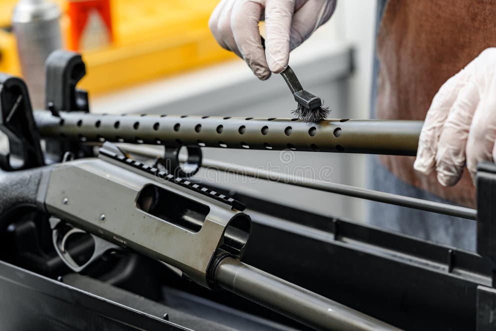 The Gunsmith Maintaining His Rifle in a Workshop Stock Photo - Image of ...
