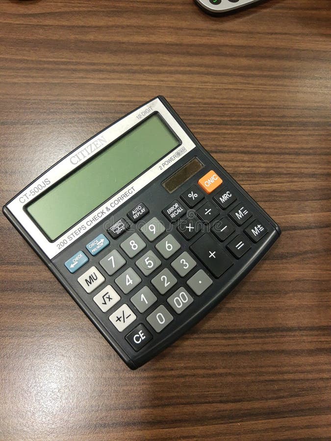 Gurgaon, India - 15-March-2020 : Calculator on Old Wood Background ...