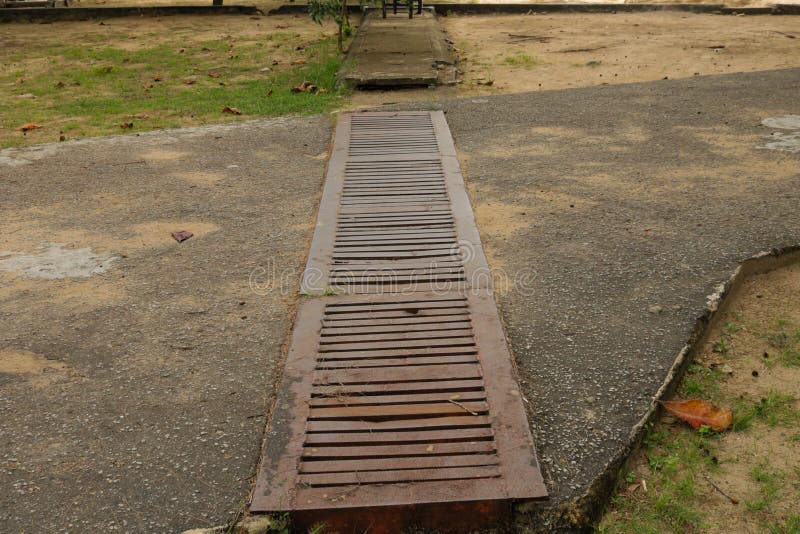 Gutter cover at the street stock image. Image of bridge - 259800797