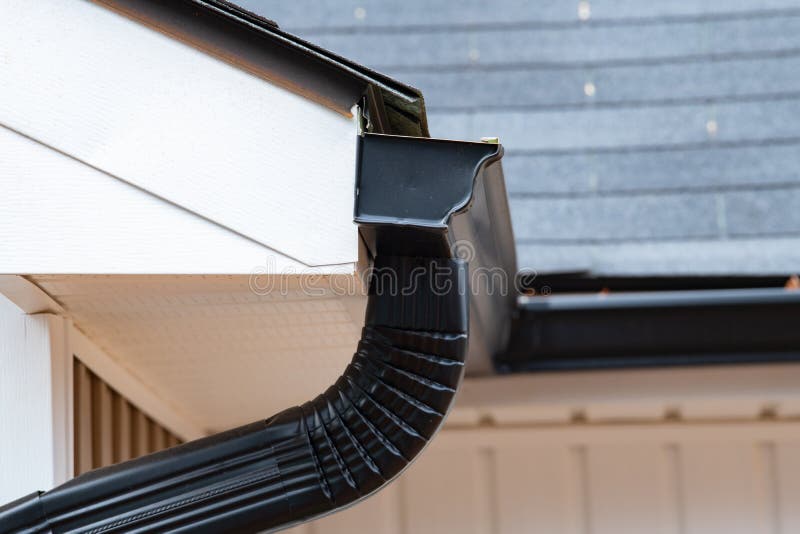 Gutter with Downpipe on the Roof of a House Stock Image - Image of ...