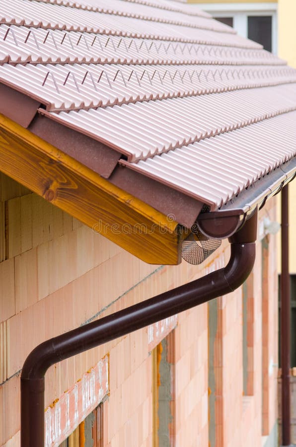 Gutter on House Corner. Metal Eave on Roof Stock Photo - Image of ...