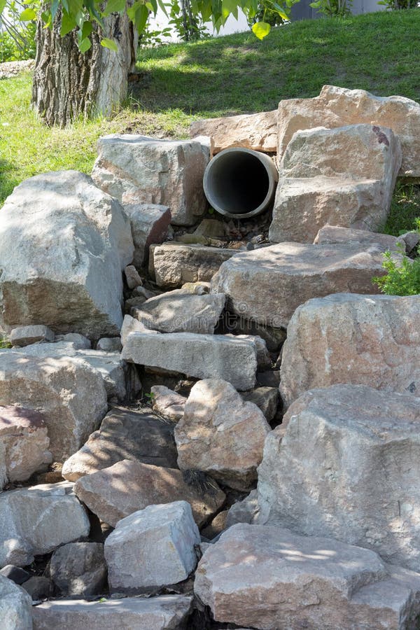 Stone gutter, with a pipe stock photo. Image of building - 191260348