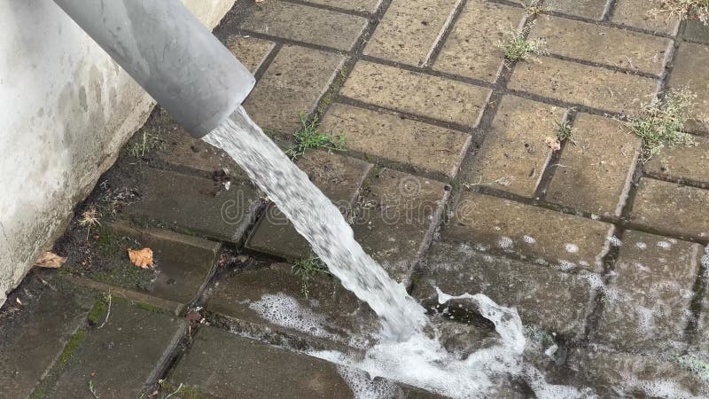 Gutter Pipe Line after Rain with Water Drainage. Drain Pipe. Stock ...