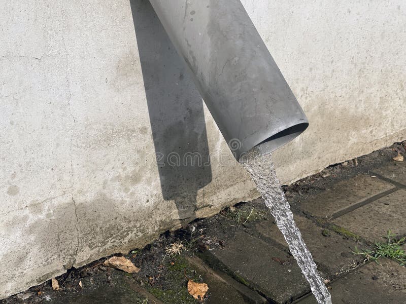 Gutter Pipe Line after Rain with Water Drainage. Drain Pipe. Stock ...