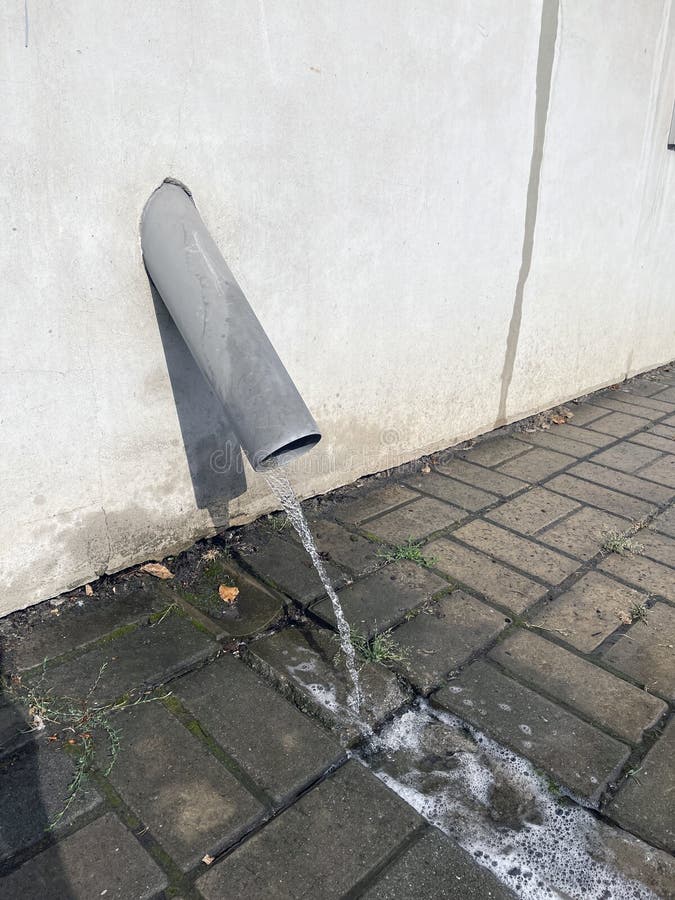 Gutter Pipe Line after Rain with Water Drainage. Drain Pipe. Stock ...