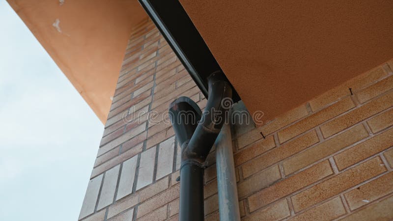 Gutter Pipe on the Wall of a House Stock Footage - Video of roof, pipe ...