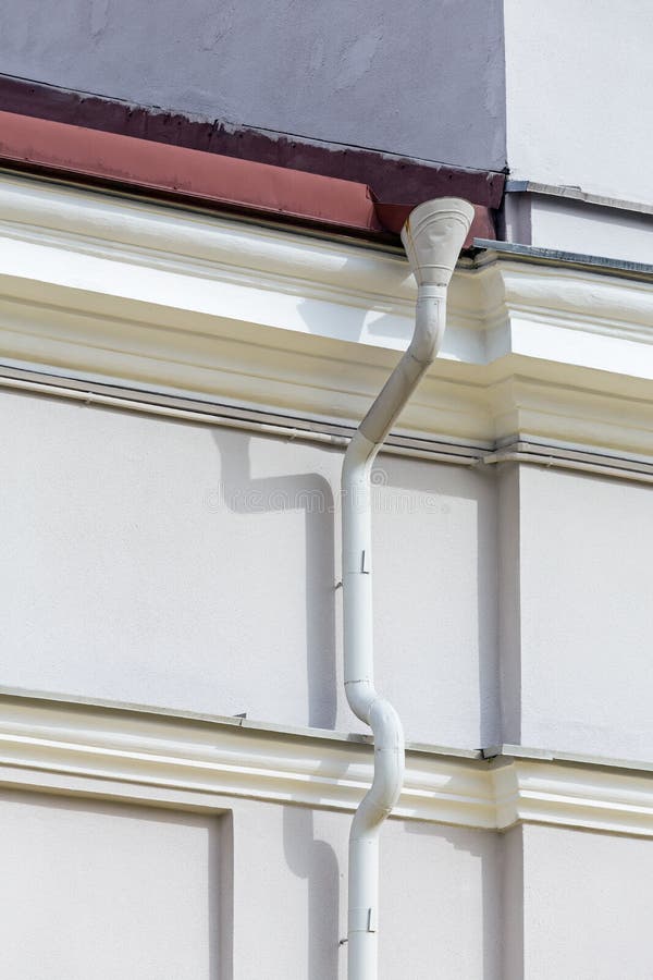 Gutter and White Plaster Wall Stock Image - Image of eaves, urban: 43365977
