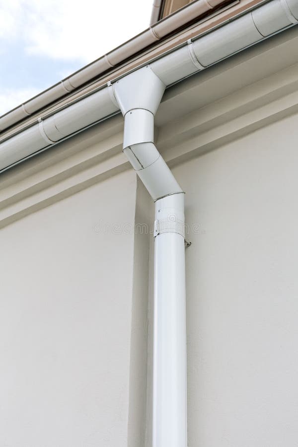 Gutter on white wall stock image. Image of outdoors, plaster - 32469811