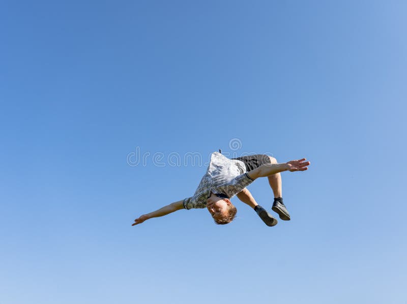 Acrobatic Somersault in the Air. Stock Image - Image of extreme, body ...