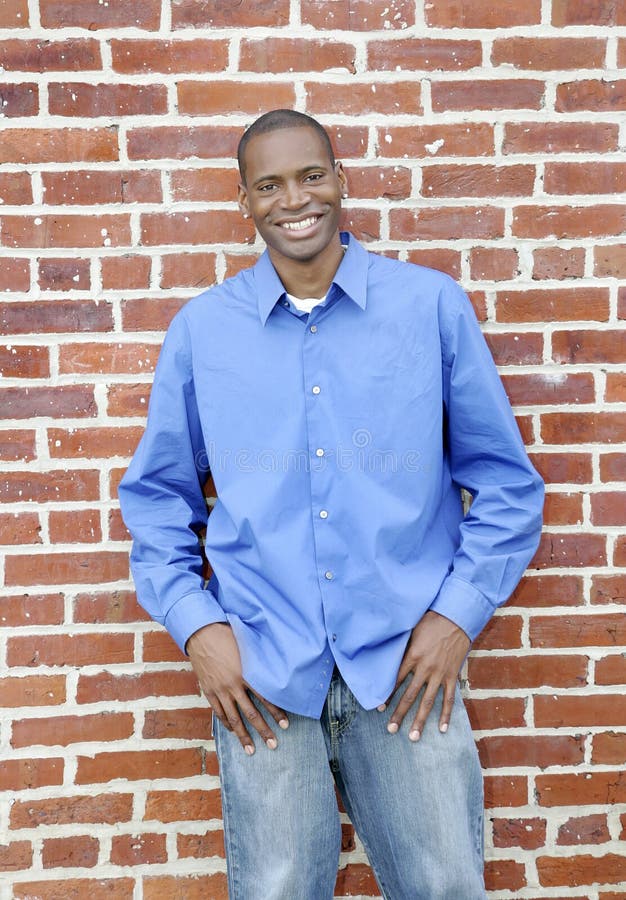 Close Up Portrait of a Cheerful Young Black Man Smiling Stock Photo ...