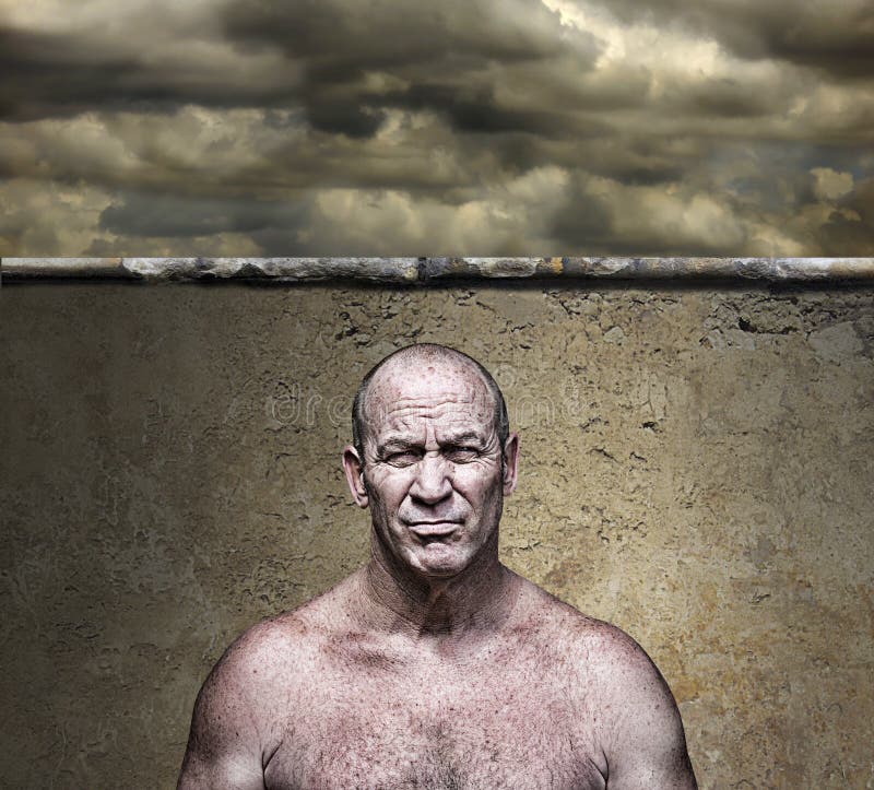 Guy Against Resistente Uma Parede Imagem de Stock - Imagem de ...