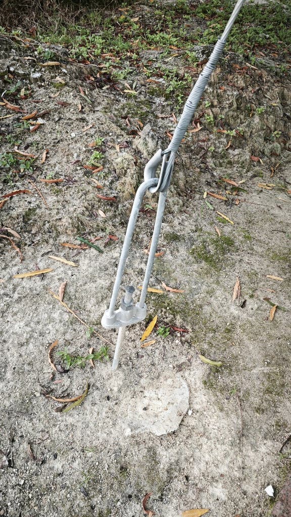 Guy Anchor Wire Balancing the Electric Pole by the Roadside. Stock ...