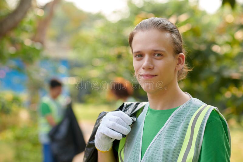 Guy with Bag of Collected Garbage Stock Image - Image of support, group ...