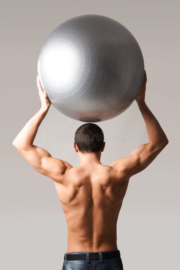 Guy with ball stock photo. Image of healthy, muscular - 12835930