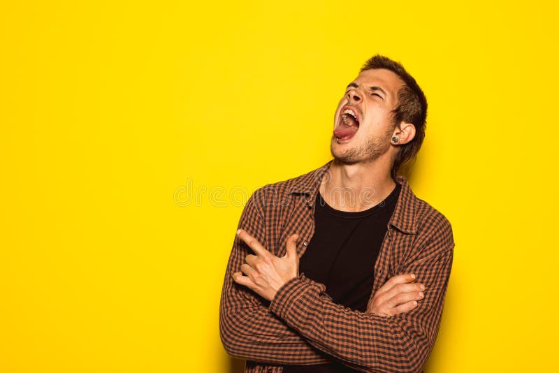 Guy with a Beard Doing a Funny and Crazy Expression Stock Photo - Image ...