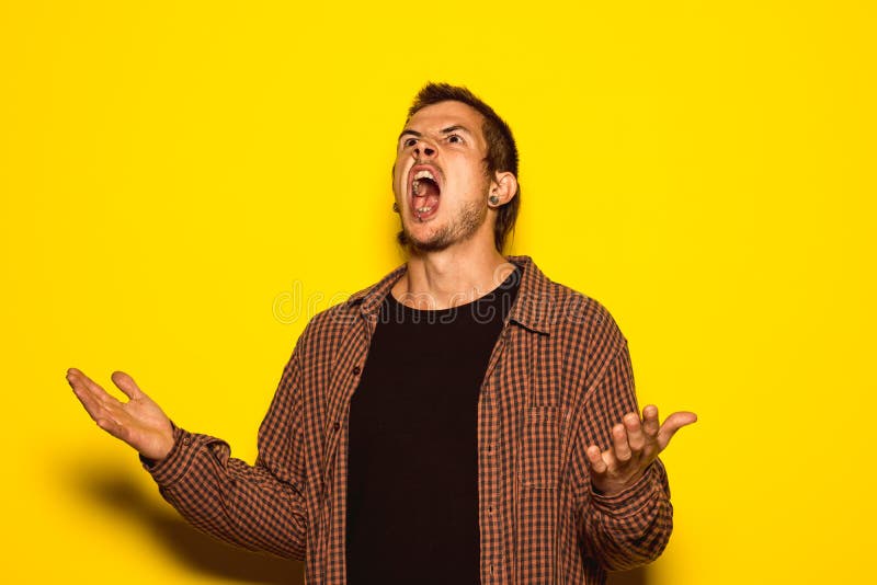 Guy with a Beard Doing a Funny and Crazy Expression Stock Photo - Image ...