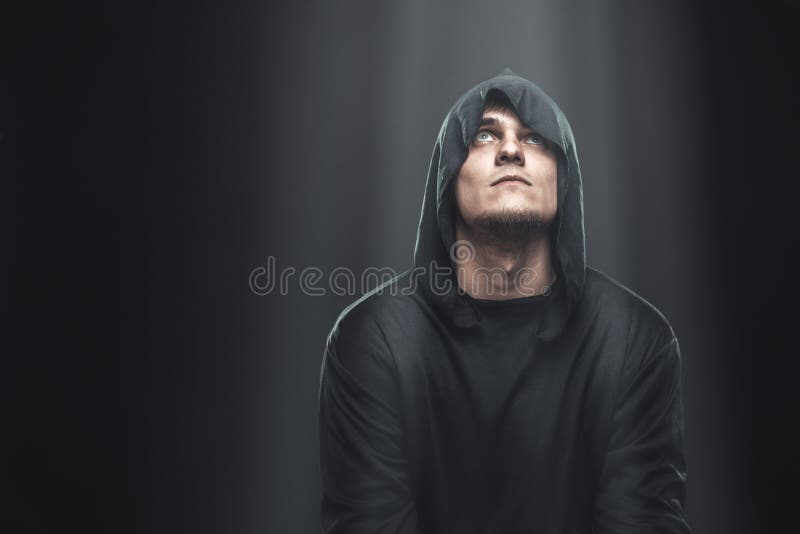 A Guy in a Black Robe Standing in the Dark Stock Image - Image of dark ...