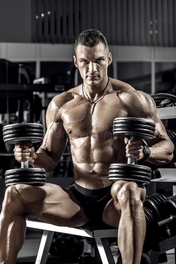 Guy Bodybuilder with Dumbbell Stock Photo - Image of dumbbell, fitness ...