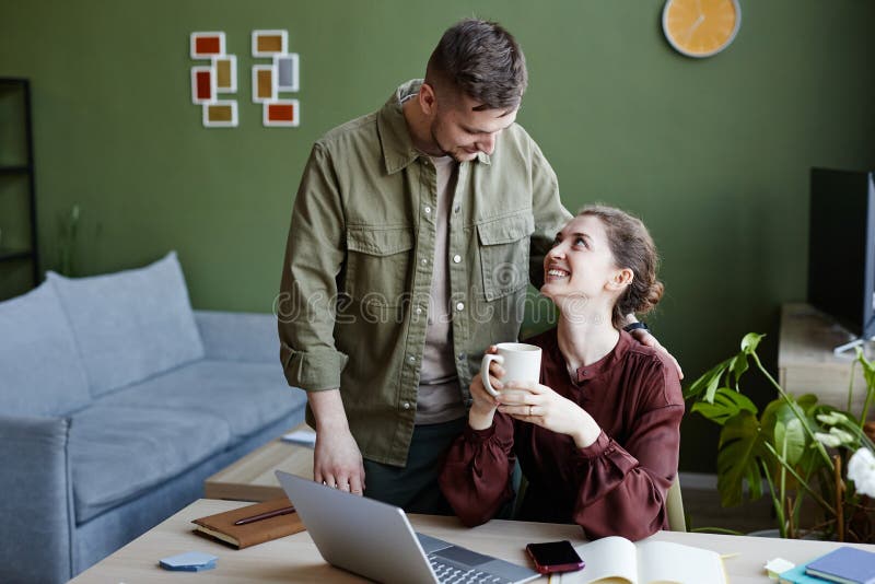 Guy Bringing Coffee for His Girlfriend Stock Photo - Image of home ...