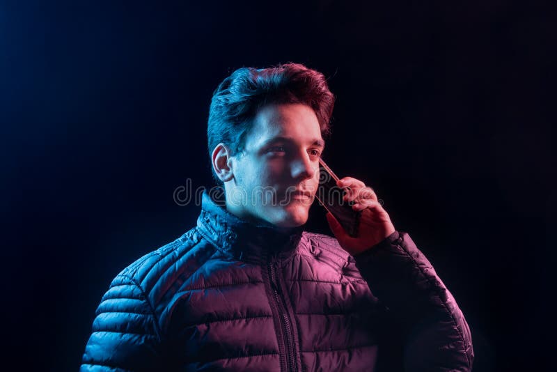 The Guy is Calling Someone on the Phone. Stock Photo - Image of shadows ...