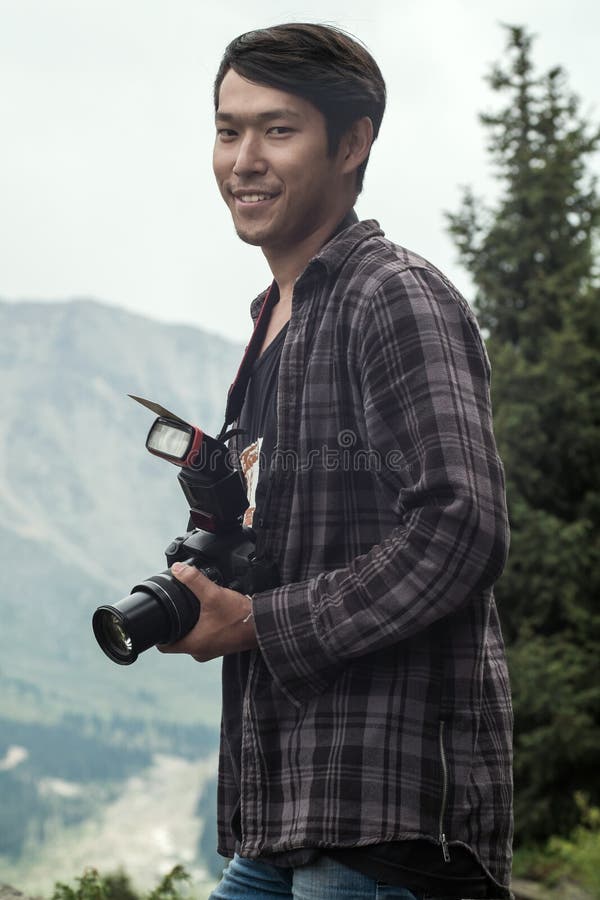 Guy with a camera stock photo. Image of digital, style - 100054730