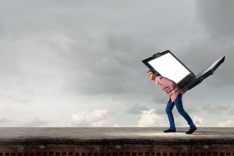Guy carrying laptop stock photo. Image of work, carry - 53071450