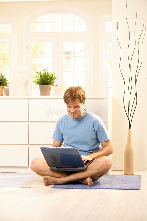 Guy with computer stock image. Image of good, cheerful - 19674259