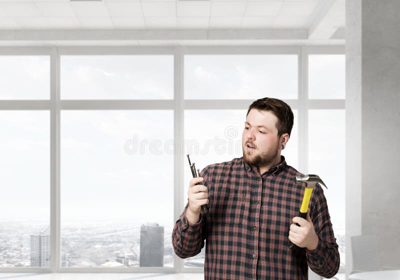 Guy with Construction Tools Stock Photo - Image of household ...