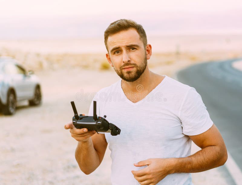 Guy Controls Drone with Remote Control Stock Image - Image of pilot ...