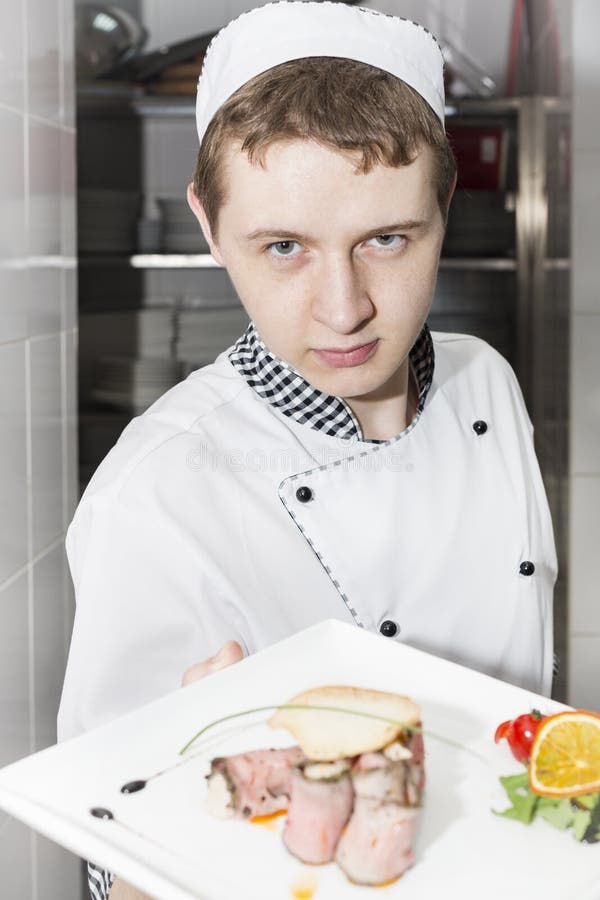 Guy Cook Preparing Delicacies Stock Image - Image of apprentice, head ...