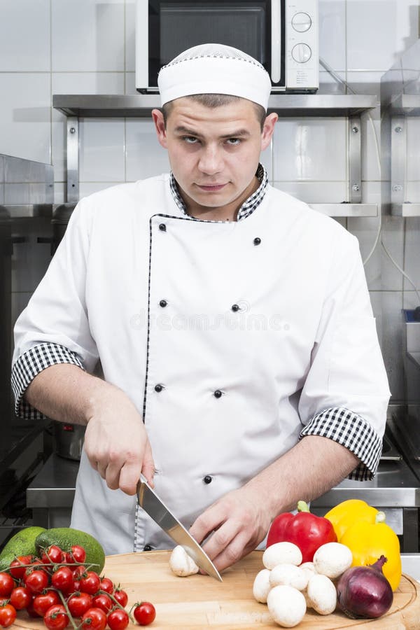 Guy Cook Preparing Delicacies Stock Photo - Image of forties ...