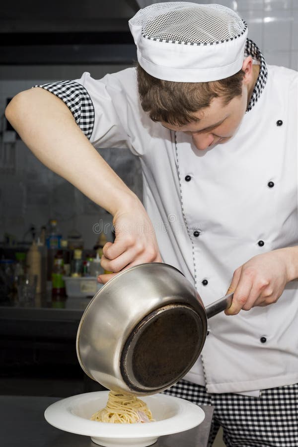 Guy Cook Preparing Delicacies Stock Image - Image of person, vertical ...