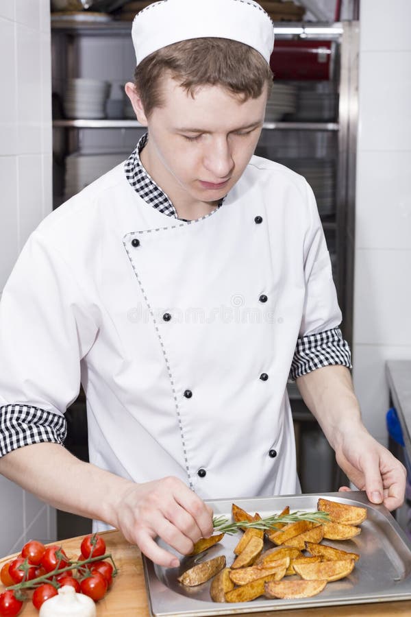 Guy Cook Preparing Delicacies Stock Photo - Image of apron, portrait ...