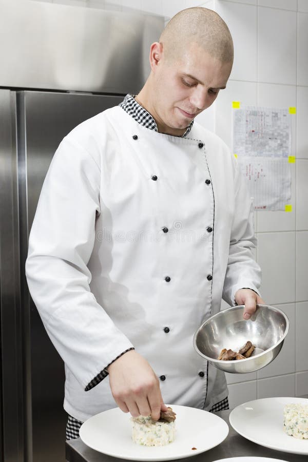 Guy Cook Preparing Delicacies Stock Image - Image of standing ...
