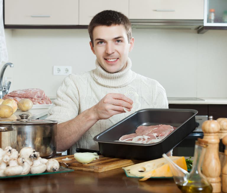 Guy cooking meat stock photo. Image of baking, prince - 39178810