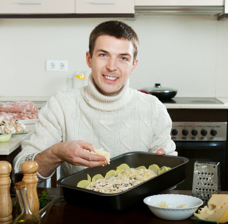 Guy Cooking Meat in Kitchen Stock Image - Image of cook, champignons ...