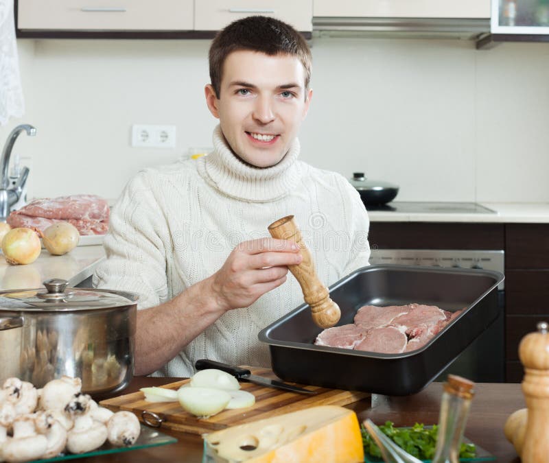Guy cooking meat stock image. Image of meat, cutting - 42880497