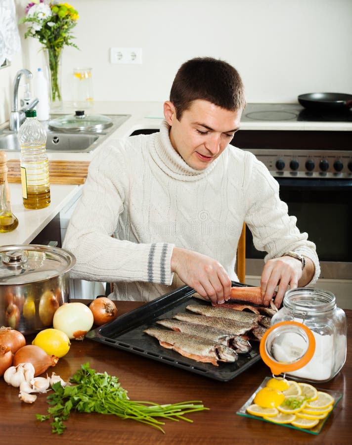 Guy Cooking Raw Fish in Roasting Pan Stock Image - Image of seafood ...