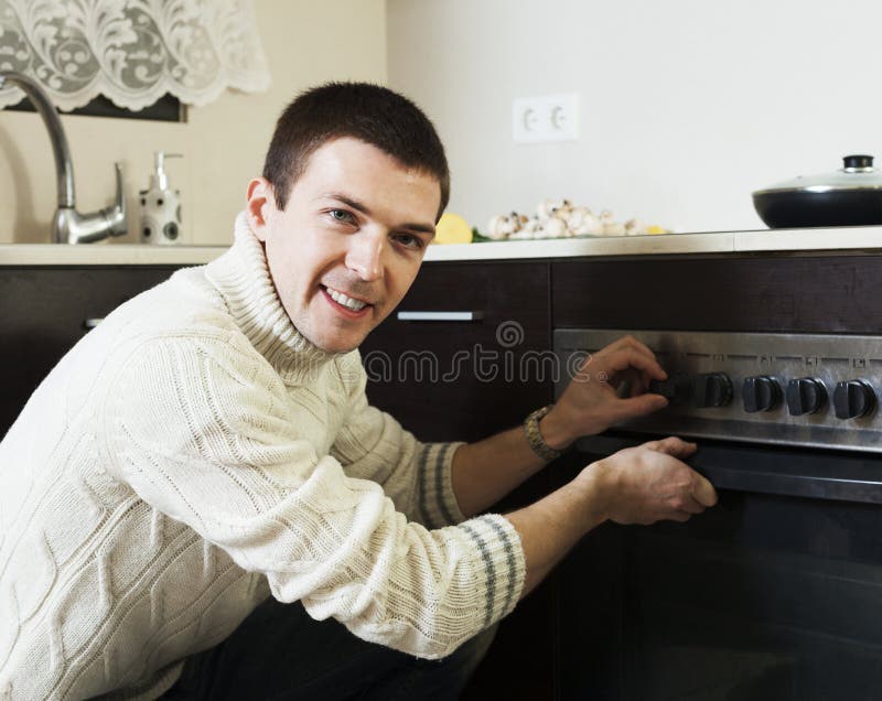 Guy Cooking Something at Home Stock Image - Image of baking, beaf: 49567535