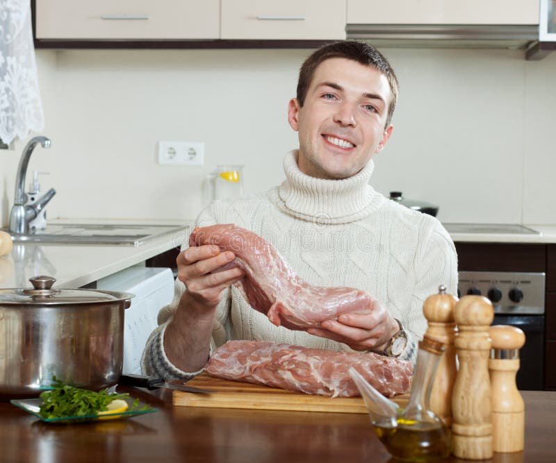 Guy cooking veal stock photo. Image of handsome, cook - 38040062