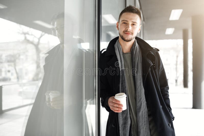 Guy in Cool Spring Clothes Relaxing while Drinking Cooffee Outside ...