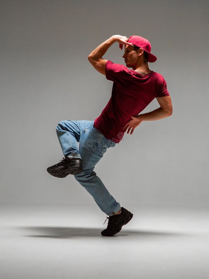 Guy Dancing Contemporary Dance in Studio. Neutral Grey Background ...