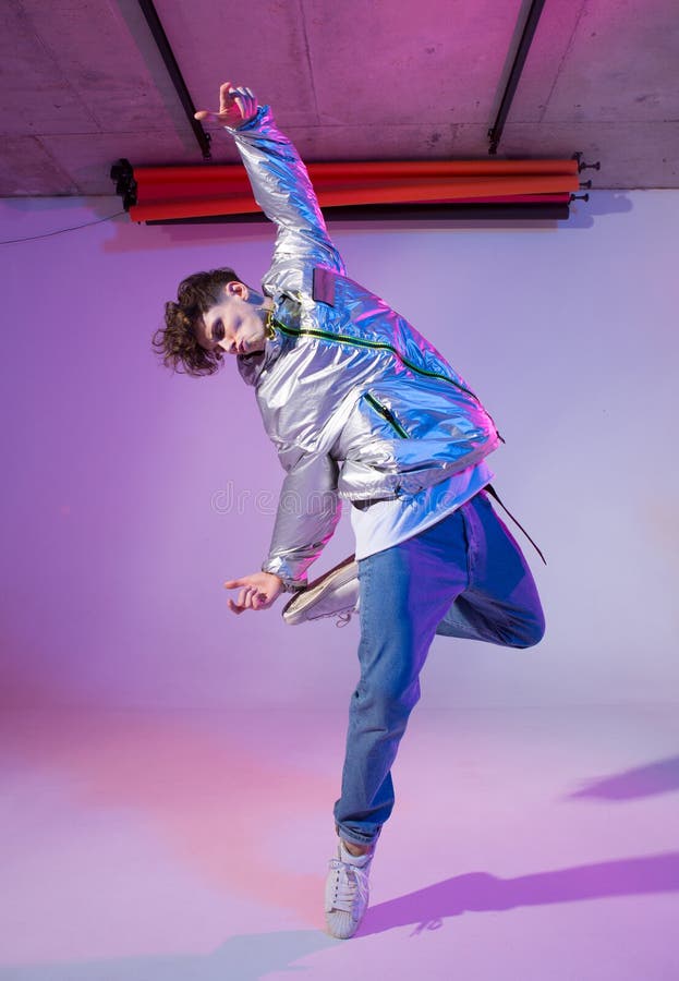 Cool Guy Dancing Contemporary Dance in Studio. Neon Light Background ...