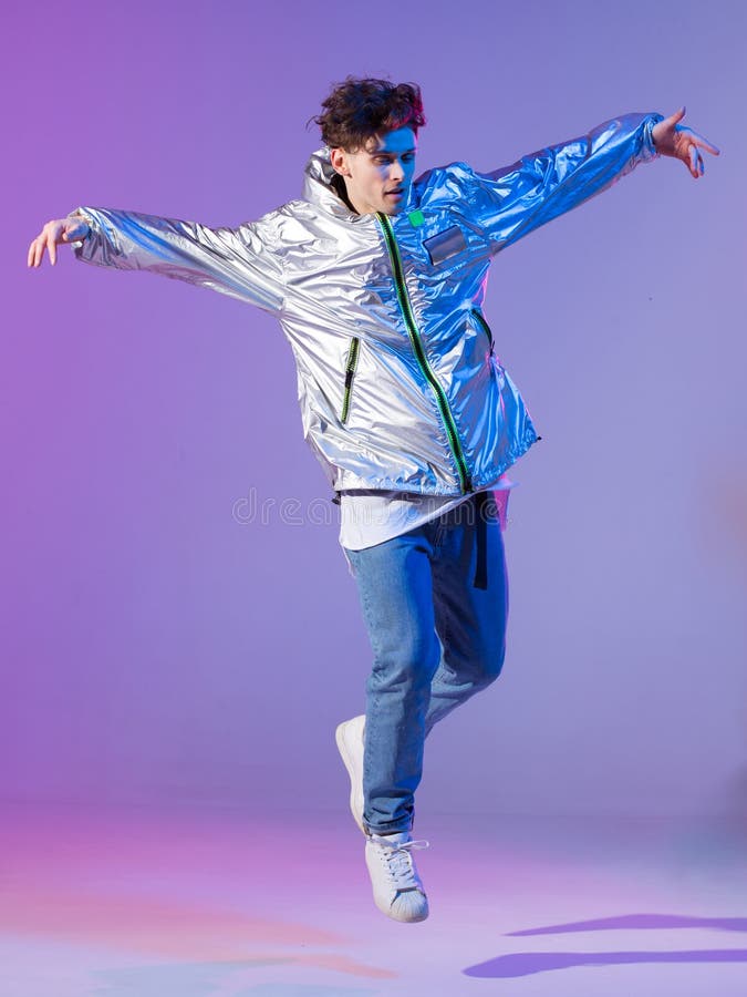 Guy Dancing Contemporary Dance in Studio. Neon Light Grey Background ...