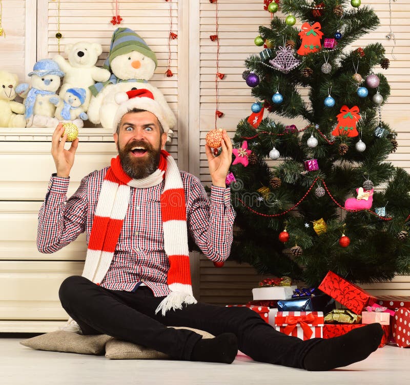 Guy Decorates Christmas Tree. Celebration and Decor Concept Stock Image ...